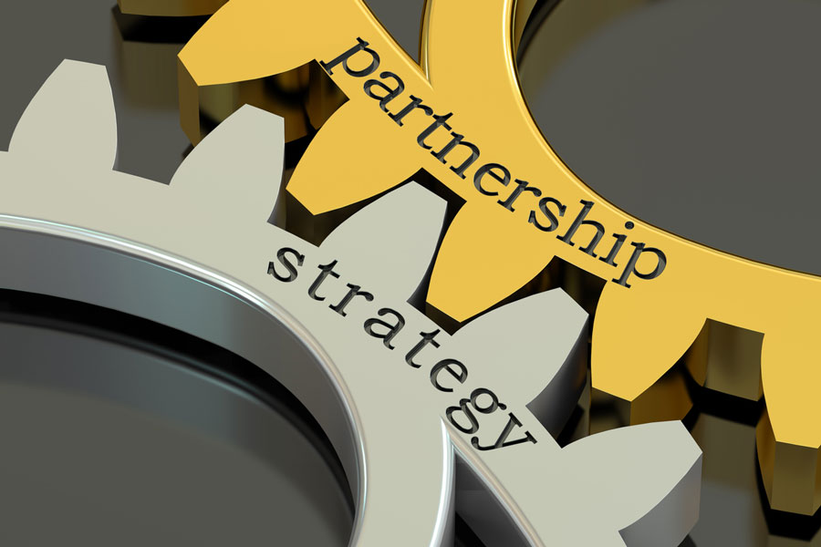 Scaling Your Business Through Strategic Partnerships | Transitions In ...